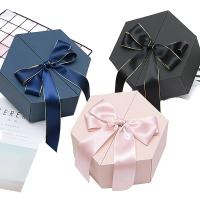 China Hexagonal Shaped Art Paper Ribbon Rigid Packaging Box Style Ideal Packaging Choice For Goods for sale