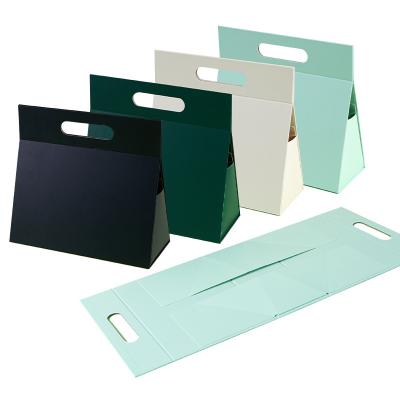 China Cosmetic Packaging Box Popular Spot One Piece Triangular Hand-held Folding Magnetic Gift Boxes with Small Batch Printing Logo for sale