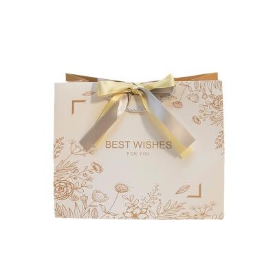 China Customized Custom Paper Gift Bags Featuring Latest Style Ideal for Retail Packaging Corporate Gifts and Special Occasions for sale