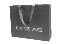 China Glossy Gift Bag With Handles , Hot Stamping Ribbon Handle Paper Bags for sale