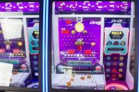 China Dreamland Original Coin Operated Ball Pusher Ticket Redemption Machine 2430×900×2500mm 450kg for sale