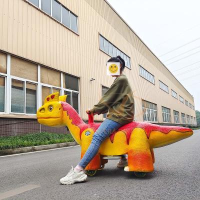 China Jurassic Park Ride On Dinosaur For Kids 100kg Load Big Yellow Electric Dinosaur Scooter for sale