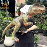 China Customized Size Green T Rex Baby Dinosaur Hand Puppet For Stage Show And Garden for sale