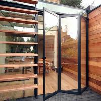 China Big Transparent Bi Folding Garage Door Aluminum Alloy Finished Surface 6063-T5 for sale