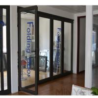 China Big Transparent Bi Folding Garage Door Aluminum Alloy Finished Surface 6063-T5 for sale