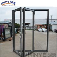 China Customized Aluminum Glass Folding Door 6063 T5 1.2mm Frame Iron Grill Window Design for sale