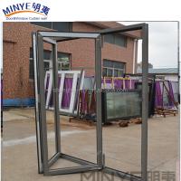 China Customized Aluminum Glass Folding Door 6063 T5 1.2mm Frame Iron Grill Window Design for sale