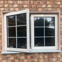 China Tempered Glass Upvc/Pvc Sliding Window with Decorative Grills and Windproof Function for sale
