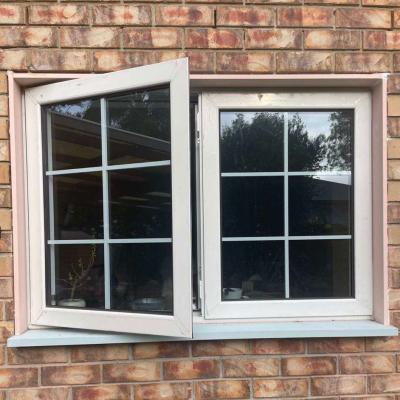 China Tempered Glass Upvc/Pvc Sliding Window with Decorative Grills and Windproof Function for sale