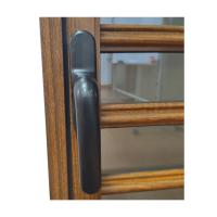 China Wood Grain Aluminum Glass Shutter Door Indoor ISO9001 CE 6063-T5 5mm Tempered Glass for sale