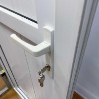 China Windproof PVC French Style Main Door UPVC Vertical Hinged Door 5mm Double Tempered Glass for sale