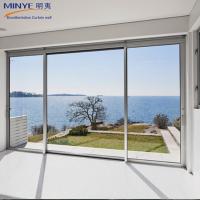 China Aluminum Hanging Wood Grain Glass Sliding Door with Prefabricated Frame 6063-T5 for sale