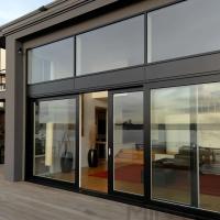 China Aluminum Patio Sliding Door Double Tempered Glass 5mm+12A+5mm Powder Coated Smooth Finish for sale