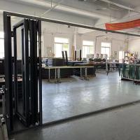 China Foldable Patio Bi-fold Thermal Break Aluminum Stacker Door 30 dB Sound Insulation for sale