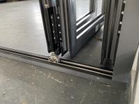 China Foldable Patio Bi-fold Thermal Break Aluminum Stacker Door 30 dB Sound Insulation for sale