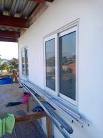 China Energy Efficient Double Tempered Glass UPVC PVC Sliding Windows for Patio 5mm 9A Argon for sale