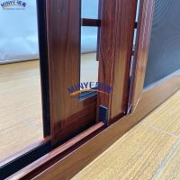 China Wood Grain Aluminum Sliding Window Double Tempered Glass 5mm+12A+5mm Built-in Spacer for sale