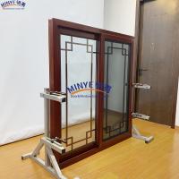 China Wood Grain Aluminum Sliding Window Double Tempered Glass 5mm+12A+5mm Built-in Spacer for sale