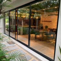 China Waterproof Stacker Door for Patio Heat Insulation Soundproof 30dB Energy Saving for sale