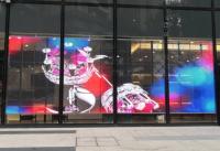 China 220W/ M2 Transparent LED Mesh Screen Outdoor Glass Window Display 5000nits 7.8mm for sale