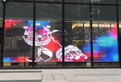 China 220W/ M2 Transparent LED Mesh Screen Outdoor Glass Window Display 5000nits 7.8mm for sale