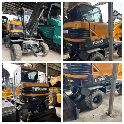 China HYUNDAI R60W-9S 6 Ton Used Wheeled Excavator 0.24m3 Bucket Yanmar Engine 360° Swing Compact for sale