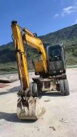 China Road-Legal KINHO XH906L 6 Ton Used Wheeled Excavator Four Wheel Drive Steering Versatility Compact Highway Speed Travel for for sale