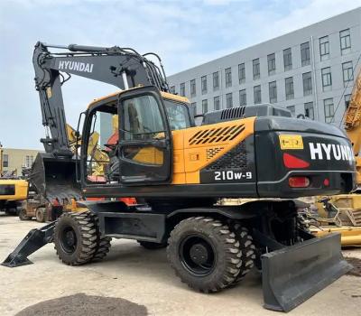 China Powerful Used Hyundai Robex 210W-9 Wheel Excavator 21 Ton HM5.9 Engine 1.2m³ Bucket Construction Digger for sale