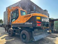 China Powerful Used Hyundai Robex 210W-9 Wheel Excavator 21 Ton HM5.9 Engine 1.2m³ Bucket Construction Digger for sale