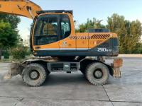 China Versatile Used DOOSAN 210w-9 Wheel Excavator 21 Ton DL06 Turbo Engine 1.34m³ Bucket Mobile Digging Machine for sale
