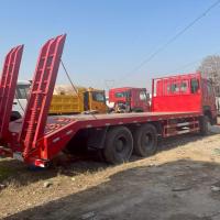 China Used 6x4 Howo 375HP Flatbed Platform Cargo Truck 25 Ton Heavy Equipment Transport Vehicle for sale