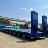 China Four Axle Lowbed Semi Trailer 60 Ton Heavy Equipment Transport Lowboy Platform Hauler for sale