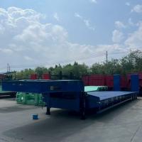China Four Axle Lowbed Semi Trailer 60 Ton Heavy Equipment Transport Lowboy Platform Hauler for sale