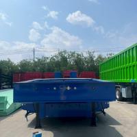 China Four Axle Lowbed Semi Trailer 60 Ton Heavy Equipment Transport Lowboy Platform Hauler for sale