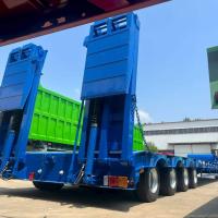 China Four Axle Lowbed Semi Trailer 60 Ton Heavy Equipment Transport Lowboy Platform Hauler for sale