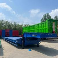 China Four Axle Lowbed Semi Trailer 60 Ton Heavy Equipment Transport Lowboy Platform Hauler for sale