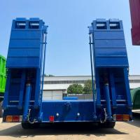 China Four Axle Lowbed Semi Trailer 60 Ton Heavy Equipment Transport Lowboy Platform Hauler for sale