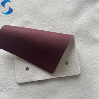 China Embossed Red Color PVC Anti Scratch Leather Fabric Wide Selection Of Patterns For Durable Stylish Products for sale