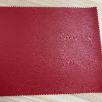 China Red faux Leather Fabric 140CM Width Lychee pattern fine texture for handbags for sale