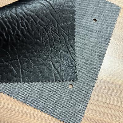 China 0.70mm Thickness PVC Artificial Leather with Lychee Pattern and Waterproof Features for Automotive Upholstery for sale