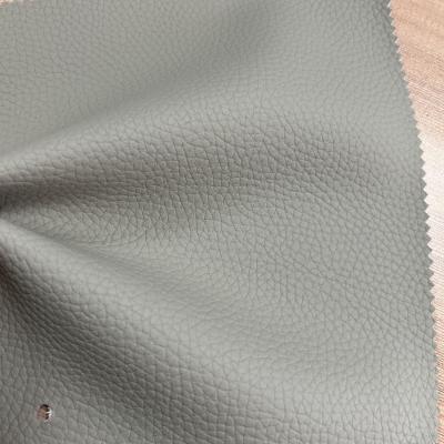 China Red faux Leather Fabric 140CM Width Lychee pattern fine texture for handbags for sale
