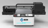 China UV Inkjet Flatbed Printer With Varnish Ink For Glossy Matte And Textured Materials for sale