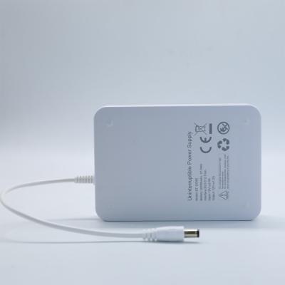 China OLAX Smart UPS 12V 37WH 10000mAh Uninterruptible Power Supply for WiFi Router Backup for sale
