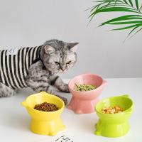 China Pet Neck Guard Ceramic Elevated Cat Bowl Foot Diagonal Dog Bowl To Prevent Spilling Water And Food Bowl for sale