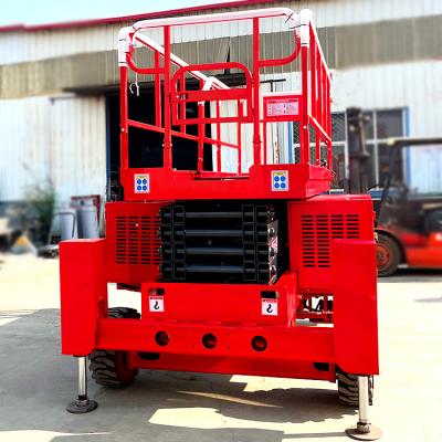 China 12m Battery Off Road Scissor Lift Four Wheel Drive Table Hydraulic Vertical Platform Lift for sale