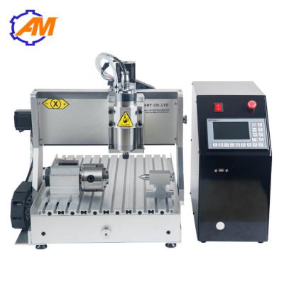China Mini cnc engraving machine for wood smart mini desktop 3040 mach3 4 axis 3d wood carving cnc router machine for sale