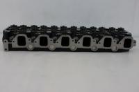 China TD42 Diesel Engine Cylinder Head 4.2L Cast Iron for Nissan Patrol 11039-06J00 11039-63T02 for sale