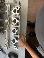 China 11100-75F00 1.0L K10A 4 Cylinder Cylinder Head for Suzuki Wagon R+ Chevrolet Alto Engine Parts for sale