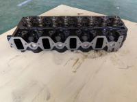 China 4D33 Cast Iron Cylinder Head Complete ME999863 for Mitsubishi Fuso Chevrolet Trucks 4 Cylinder for sale