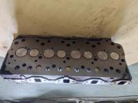 China 4D33 Cast Iron Cylinder Head Complete ME999863 for Mitsubishi Fuso Chevrolet Trucks 4 Cylinder for sale